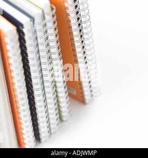 Notebooks with spring standing in a line Stock Photo - Alamy