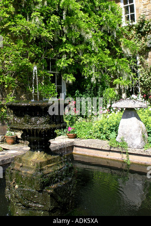 fountain with water lillies Stock Photo - Alamy