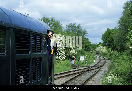 Diesel locomotive and driver on the Battlefield Line at Shenton Station ...
