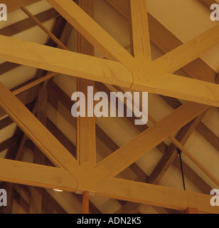 Wooden beams on apex ceiling in Spanish country kitchen with fretwork ...