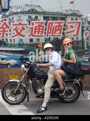 couple riding a motorcycle Stock Photo - Alamy