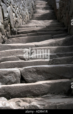 Steep ancient stone stairs carved into the rock by the Inca at Huayna ...