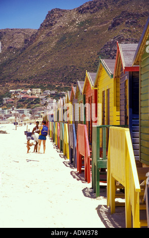 Bright coloured beach huts standing on a sea side promenade Stock Photo ...