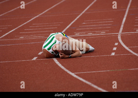 athlete exhausted after race Stock Photo - Alamy