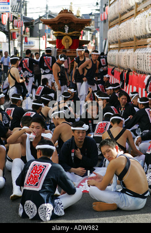 Festival goers dressed in Japanese mid-age dynasty costumes parade ...