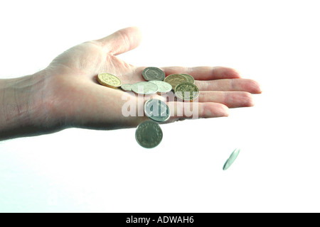 money falling through fingers Stock Photo: 12668207 - Alamy