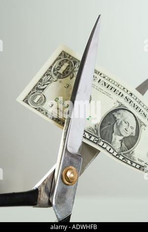 Scissors cost-cutting money Stock Photo - Alamy