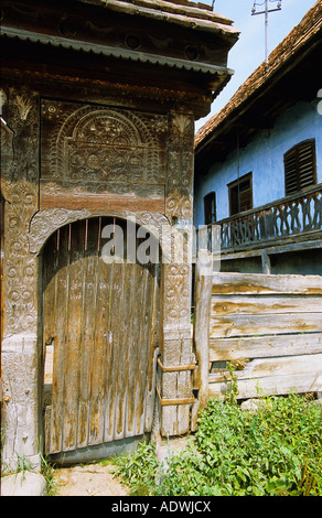 Ornamental carved wood Szekely village farm gate Transylvania Romania ...