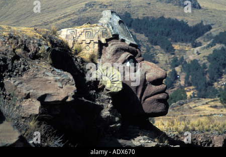 Massive stone carved Inca heads flank either side of highway Chucuito ...