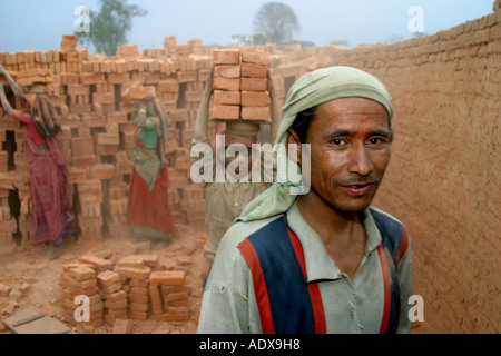 Women and children are doing heavy labour by working in stone factories ...