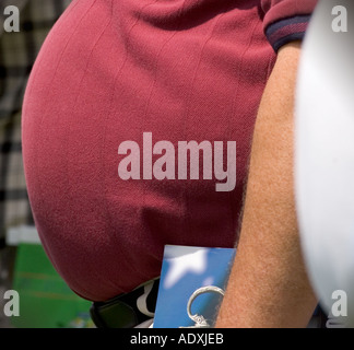 Fat Man Standing in Profile and Holding her Belly Stock Photo - Alamy