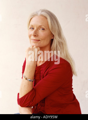 Attractive woman 50 years old with a tablet in hands Stock Photo - Alamy