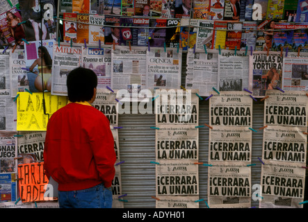 Spanish language Mexican newspapers at a news stand in downtown, Cancun ...