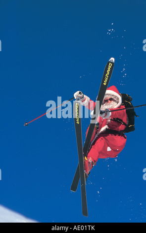 Fun Santa Claus with skiing equipment decoration at a Christmas market ...