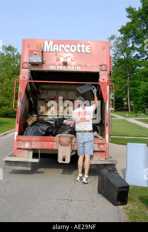 Residential trash collection crew pick up waste products Stock Photo ...