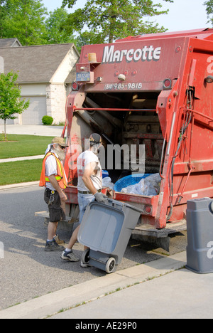 Residential trash collection crew pick up waste products Stock Photo ...