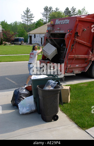 Residential trash collection crew pick up waste products Stock Photo ...