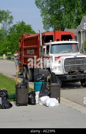 Residential trash collection crew pick up waste products Stock Photo ...