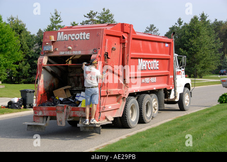 Residential trash collection crew pick up waste products Stock Photo ...