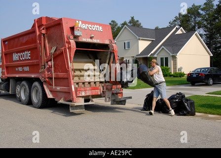 Residential trash collection crew pick up waste products Stock Photo ...