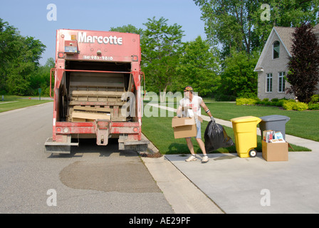 Residential trash collection crew pick up waste products Stock Photo ...