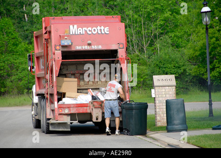 Residential trash collection crew pick up waste products Stock Photo ...