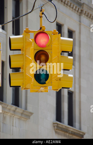 Traffic stop sign at an intersection with speed bump Stock Photo - Alamy