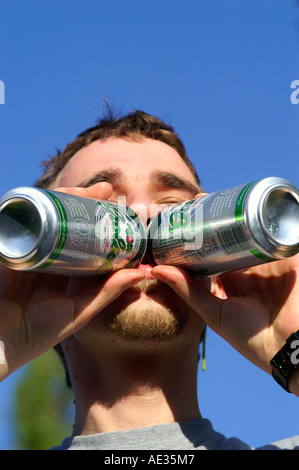 portrait of a teenage boy drinking beer Stock Photo - Alamy