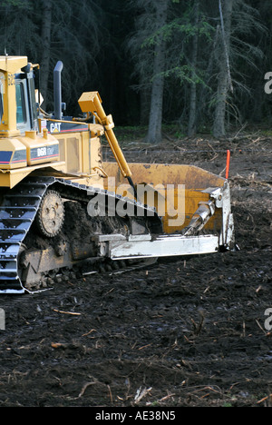 Close up of a bull dozer working at a local council civic amenity ...