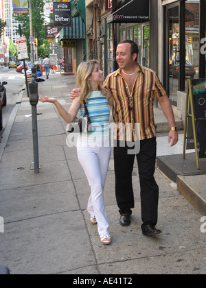 happy young couple walking and having fun in the autumn park Stock ...
