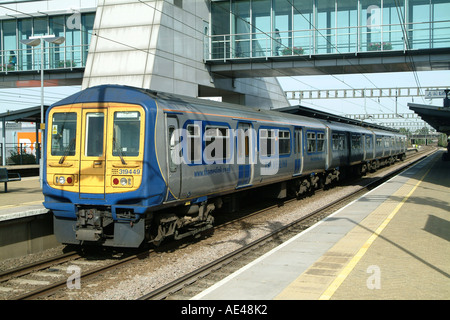 Thameslink class 319 passenger train at a railway station in the UK ...