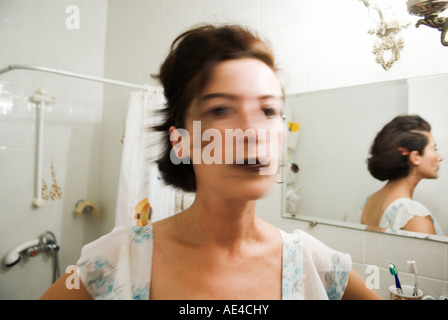 woman with snotty attitude in bathroom Stock Photo - Alamy