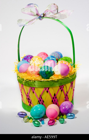 Easter Basket filled with eggs and candy Stock Photo - Alamy