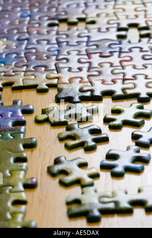 Jigsaw Puzzle and Pieces in Progress Stock Photo - Alamy