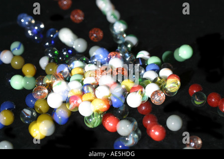 Glass marbles scattering in all directions Stock Photo - Alamy