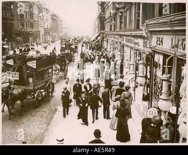 Bustling scene on Oxford Street, London's iconic red double-decker ...