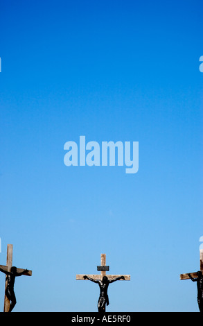 Three crosses stand tall behind the iconic Giant Cross at Groom, Texas ...