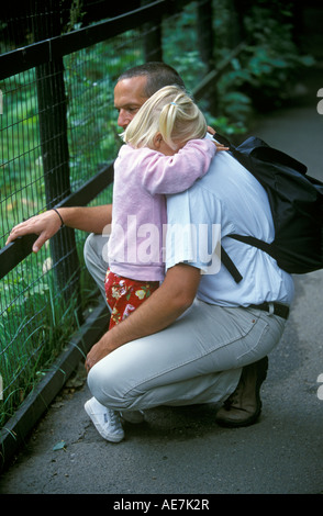 Father comforting daughter Stock Photo - Alamy