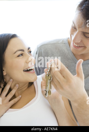Handing over keys to house Stock Photo - Alamy