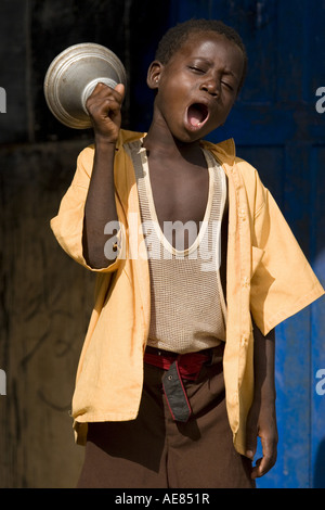 Boy Ringing Bell Stock Photo - Alamy