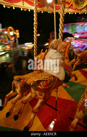 Child on Carousel at Goose Fair, Nottingham Stock Photo - Alamy