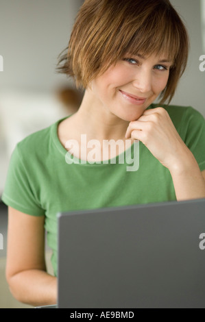 Young woman smiling confident using smartphone at street Stock Photo ...