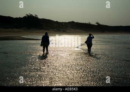 Strolling through the surf on the Zululand Coast at Sodwana Bay ...