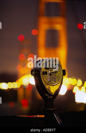 Coin operated binoculars with the San Francisco Golden Gate Bridge in ...