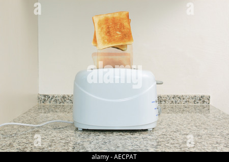 toast is bouncing out of a toaster Stock Photo - Alamy