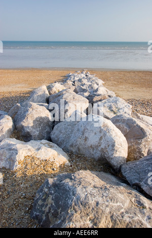 Sea defence scheme consisting of piles of large rocks and boulders ...