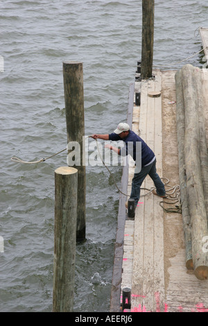 Throwing a heaving line Stock Photo - Alamy