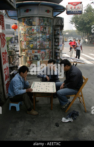 people playing Chinese checkers on the street. Beijing, China Stock ...