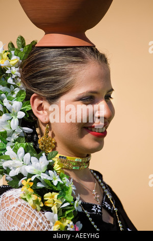girl of Paraguay making the traditional dance of bottle and the pitcher ...