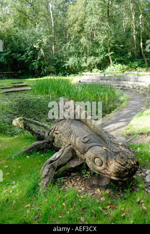 Carved log in England Stock Photo - Alamy